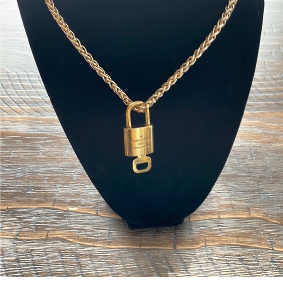 Louis Vuitton | Bags | Louis Vuitton Lv Gold Lock Key 32 With Chain ...